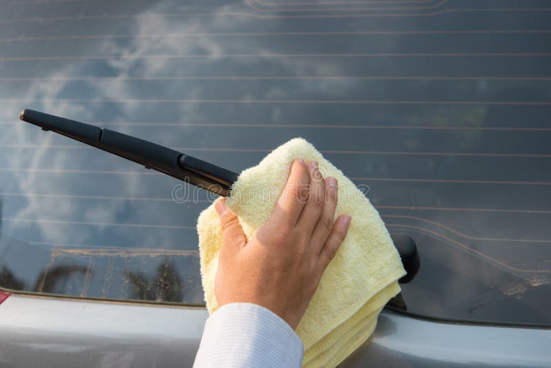 Hand Picking Up Wiper Cleaning Stock Photo - Image of outdoors, cloth ...