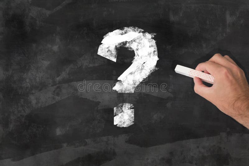 Hand with a Piece of Chalk Drawing a Question Mark on Blackboard Stock ...