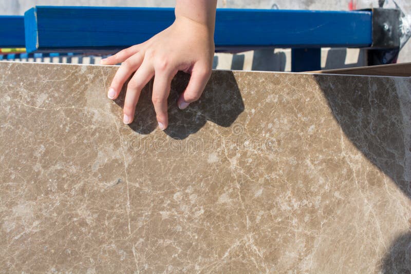 Hand on Piece of Marble Stone Stock Image - Image of surface, natural ...