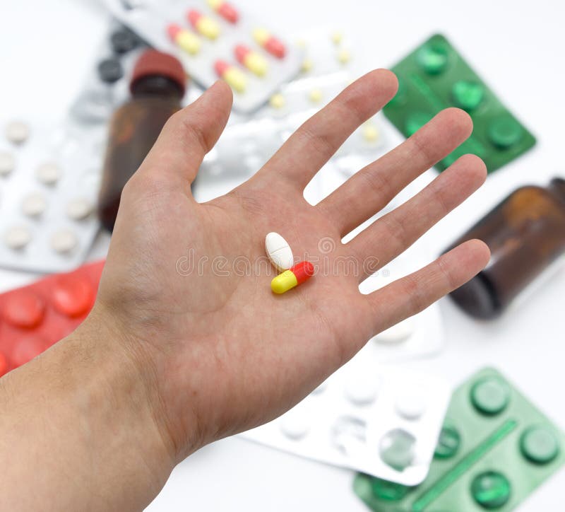 Hand with pills stock photo. Image of addiction, aspirin - 12583636