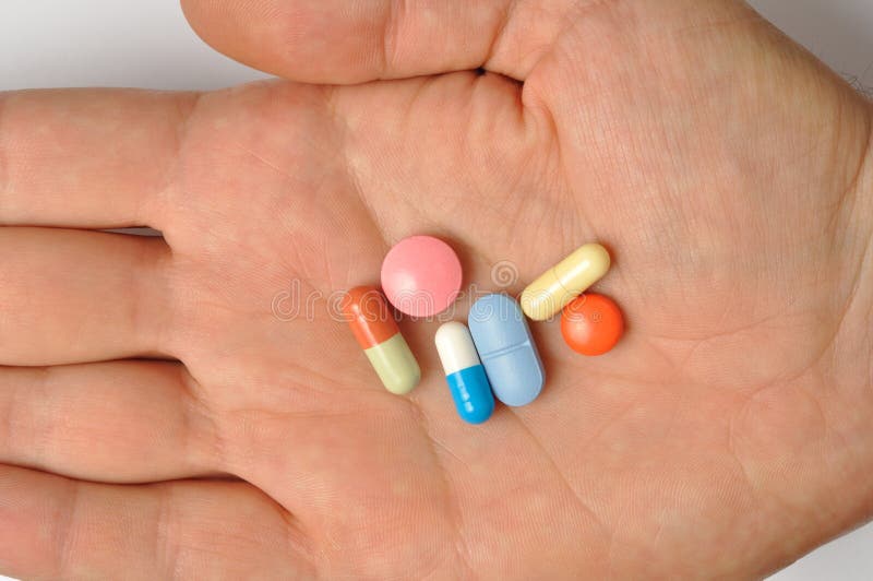 Hand with Pills stock photo. Image of give, drugs, health - 15108868