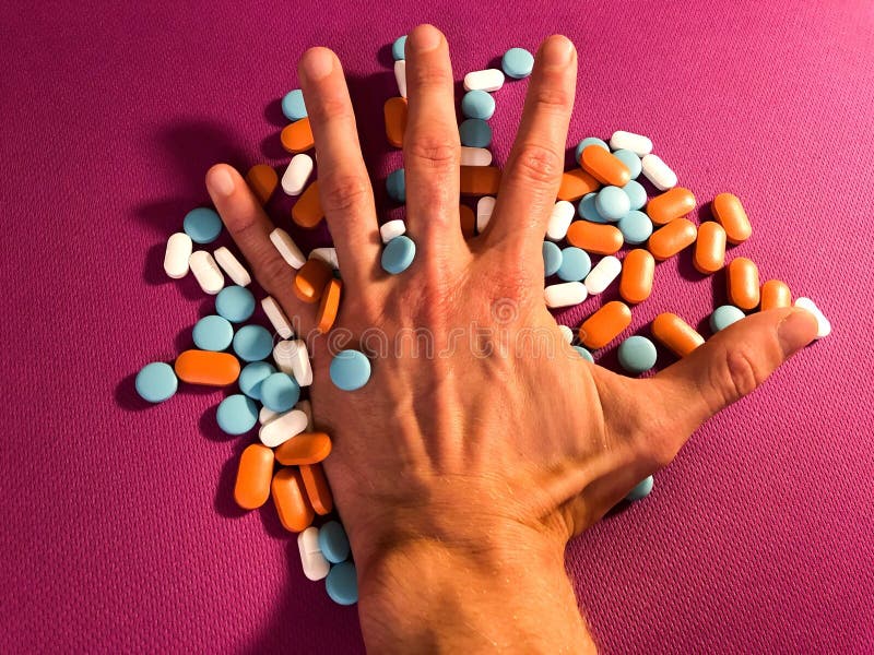 Hand with pills stock photo. Image of vitamine, drugsore - 127454708