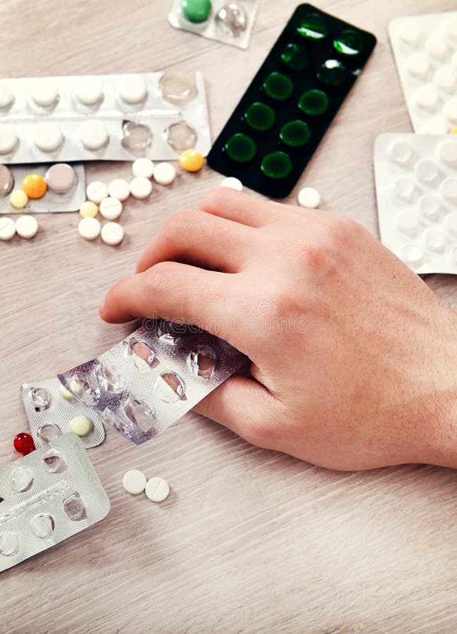 Hand with pills stock photo. Image of pharmaceutical - 20041188
