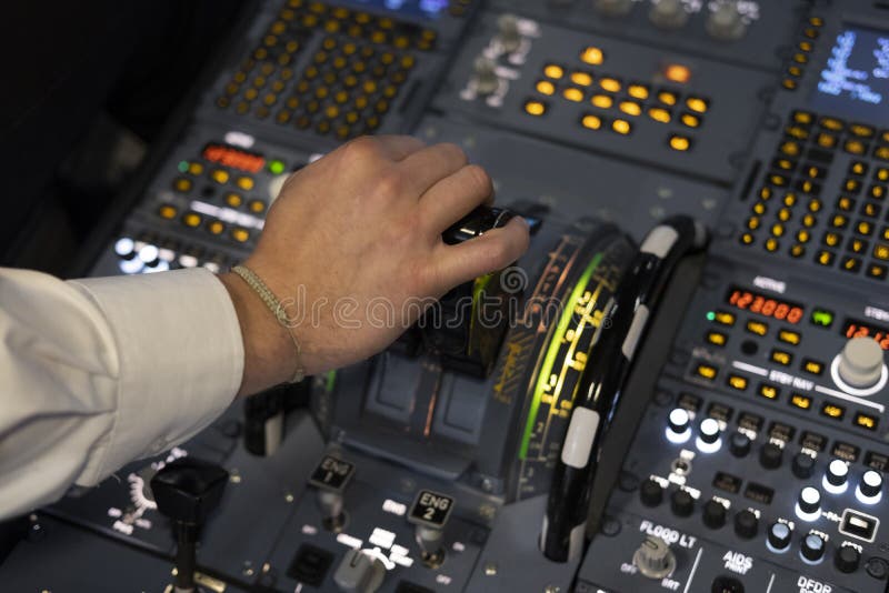 Pilot`s Hand Activating the Acceleration Lever of a Commercial Flight ...