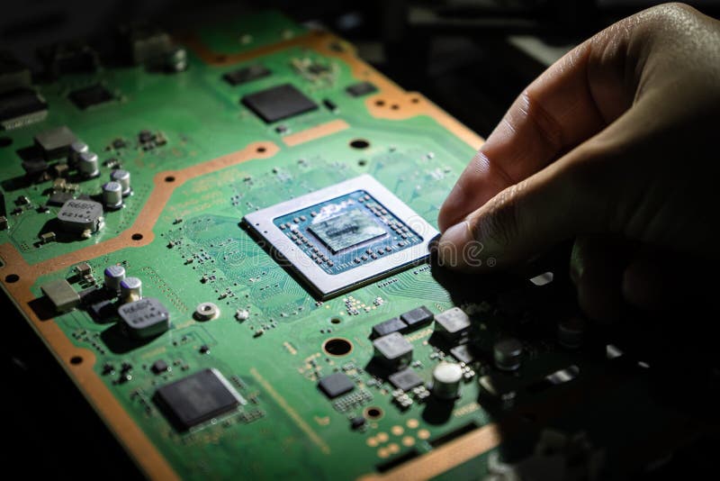 Hand Placing Microprocessor on Board Stock Photo - Image of component ...