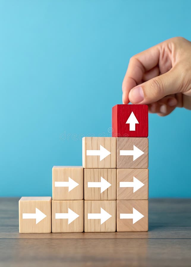 Hand Placing a Red Block with an Up Arrow, Representing Growth and ...