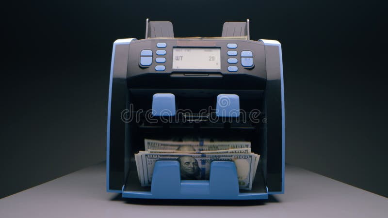 A Hand Places Cash into a Bill Counter, a Modern Device Designed for ...