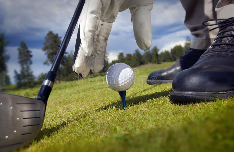 Hand Placing a Tee with Golf Ball Stock Image - Image of nature, travel ...