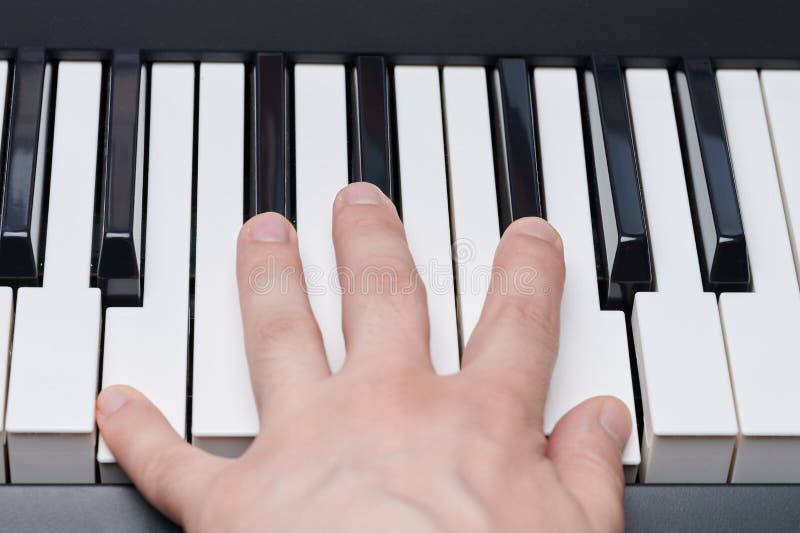 Hand play on piano stock image. Image of closeup, button - 259663557