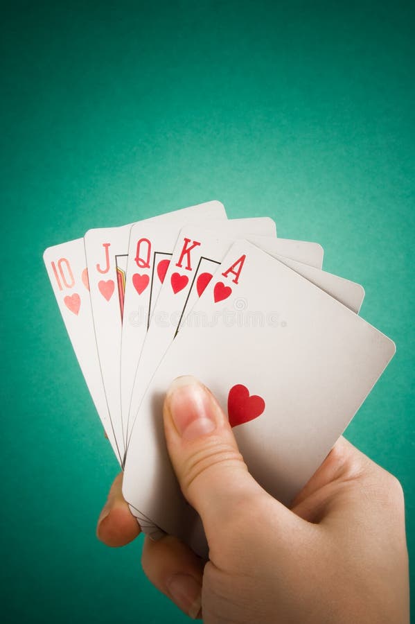 Hand holding playing cards stock photo. Image of heart - 32249212