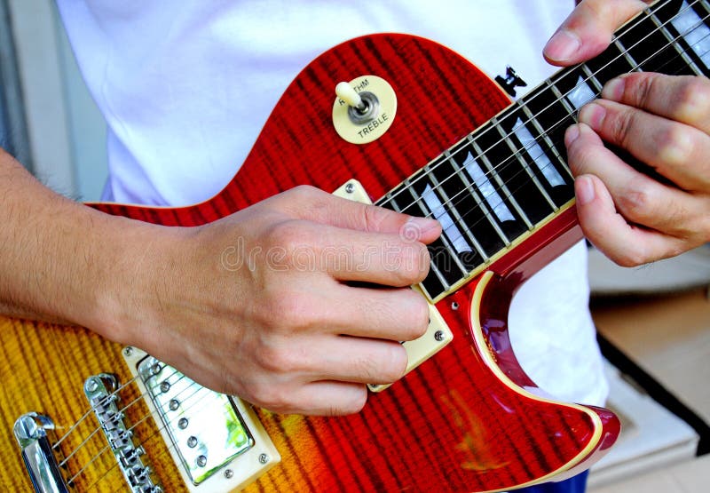 Hand playing guitar stock photo. Image of emotion, musician - 20902170
