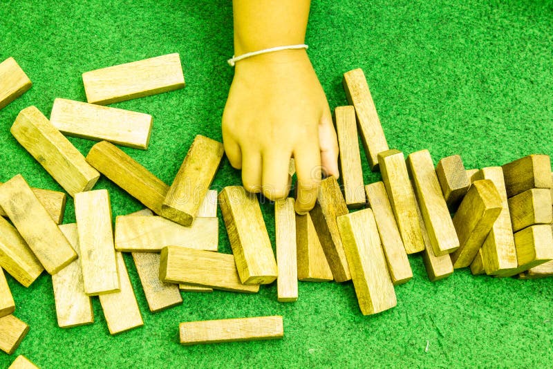 Hand playing jenga stock image. Image of pick, metaphor - 53582727