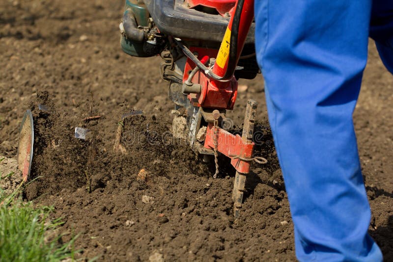 Hand plowing. stock photo. Image of machine, garden, agriculture - 52981176