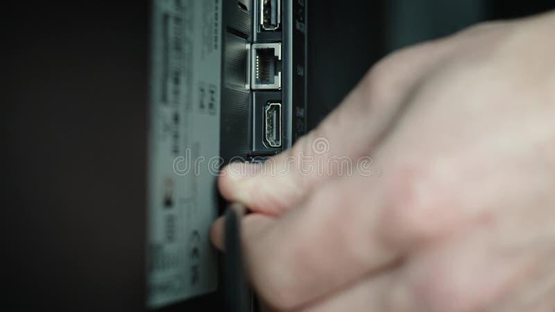 Hand Plug in HDMI Cable into TV Set Stock Video - Video of connector ...