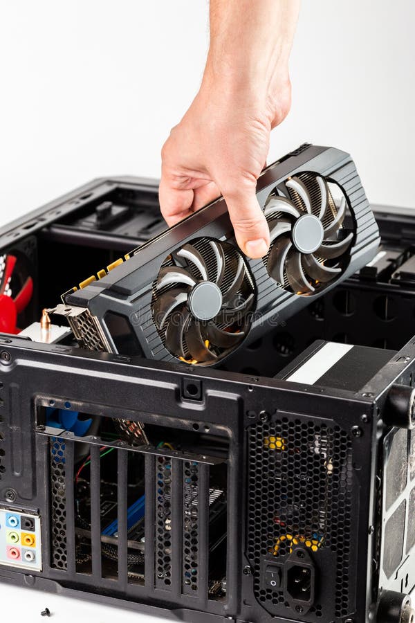 Hand Plugging a Video Card while Maintenance Personal Computer Hardware ...