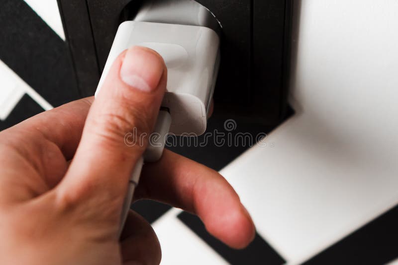 Hand Plugs into a Power Outlet Stock Photo - Image of volt, electricity ...