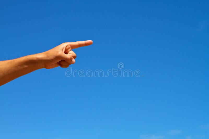 Hand Pointing Against Blue Sky Stock Photo - Image of point, direction ...