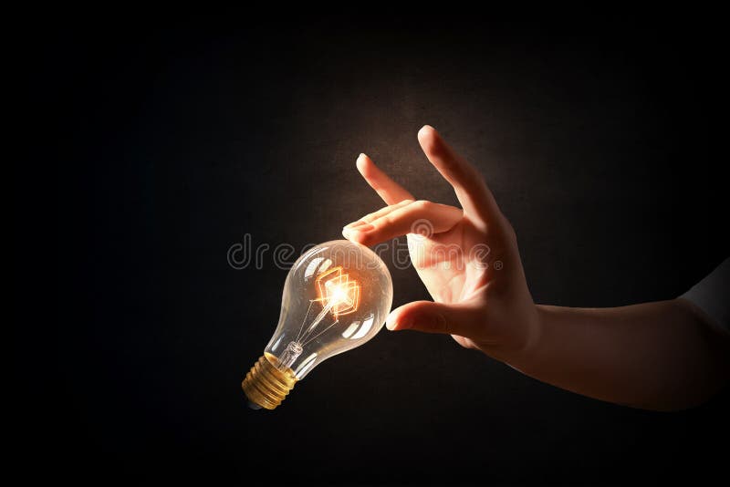 Hand Pointing Light Bulb . Mixed Media Stock Image - Image of ...