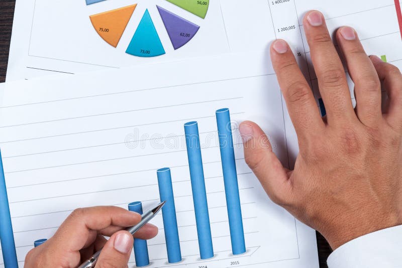 Hand Pointing a Pen at the Chart Stock Image - Image of chart ...