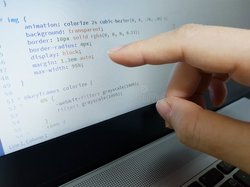 A Hand Pointing at Programming Codes Stock Photo - Image of document ...