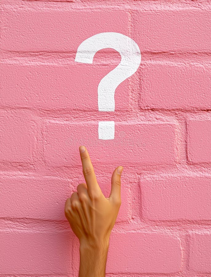 Hand Pointing at a Question Mark on a Pink Brick Wall in a Bright ...