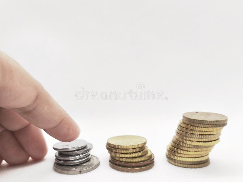 A Hand Pointing on a Stack of Coins Stock Photo - Image of saving ...