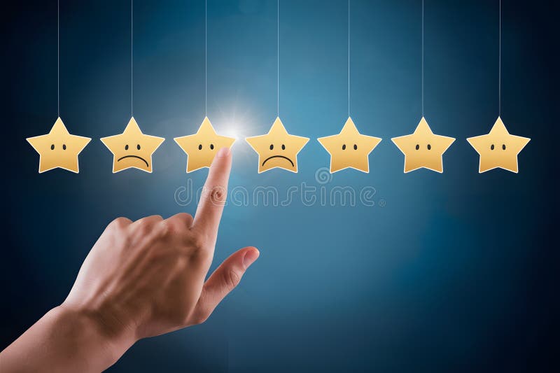 Hand Pointing at Stars, One with a Sad Face, on Blue Background Stock ...