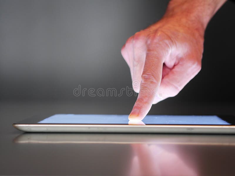 A Hand Pointing at a Tablet Screen Stock Image - Image of medium, adult ...