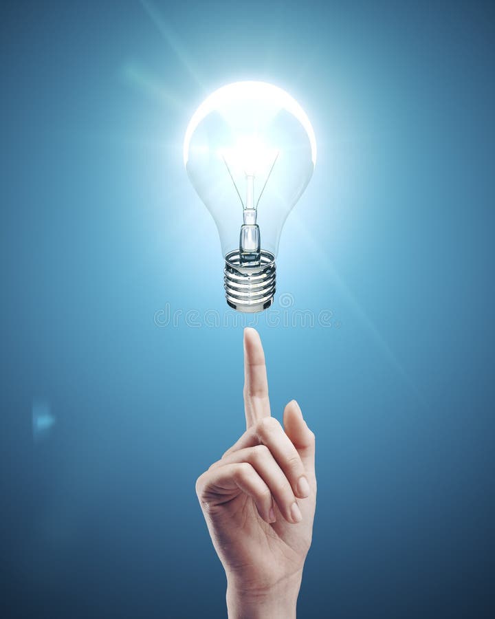 Hand Pointing To Light Bulb Stock Image - Image of creative, glow ...