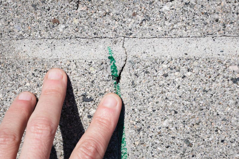 Hand Pointing To Marked Out Cracked Mortar Joint. Stock Image - Image ...