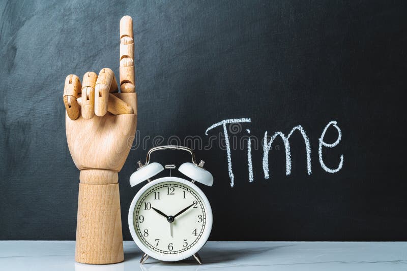 Hand Points To an Alarm Clock Stock Image - Image of hand, benefit ...