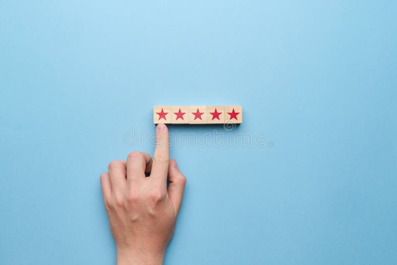 The Hand Points To the Five-star Concept of High Score Stock Photo ...