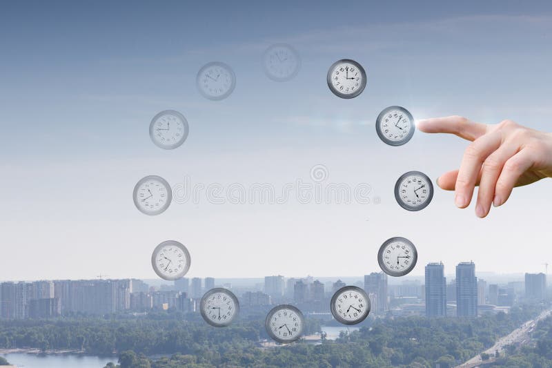 Hand Points Towards Floating Clocks in a City Skyline Stock Image ...
