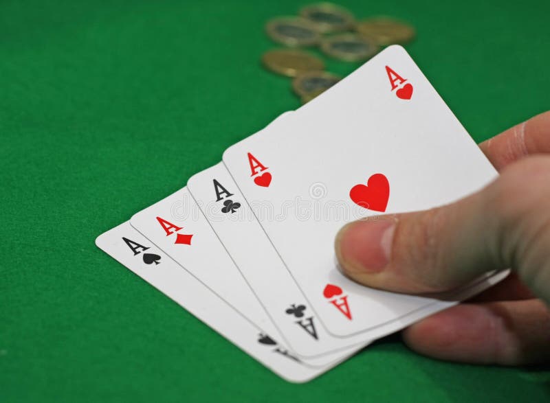 Hand with Poker of Aces on a Table Game Stock Image - Image of hearts ...