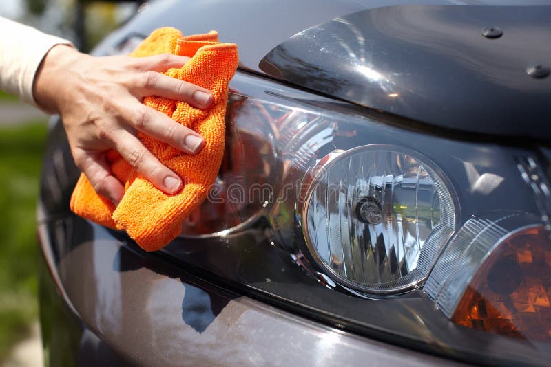 Hand polishing car. stock image. Image of headlamp, automobile - 35581377