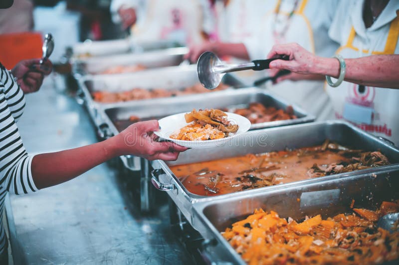 The Hand of the Poor is Given Free Food from Volunteers : Help and ...