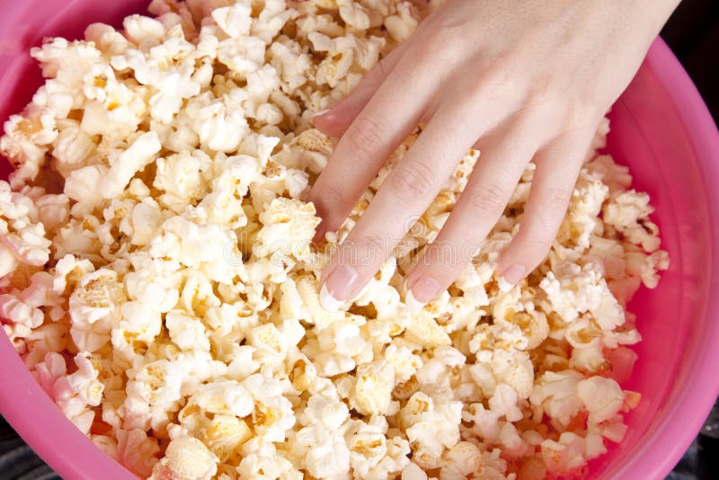 Hand in popcorn stock photo. Image of taste, horizontal - 17133798
