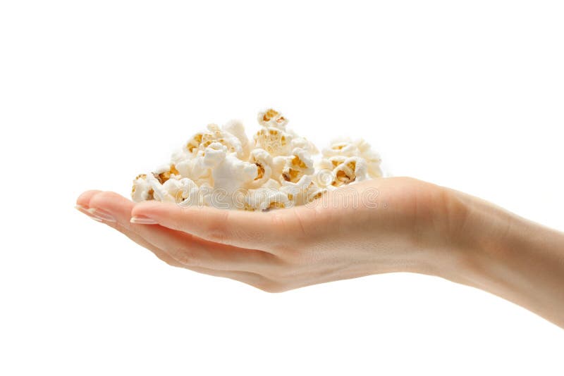 Hand with popcorn stock image. Image of salted, delicious - 23910213
