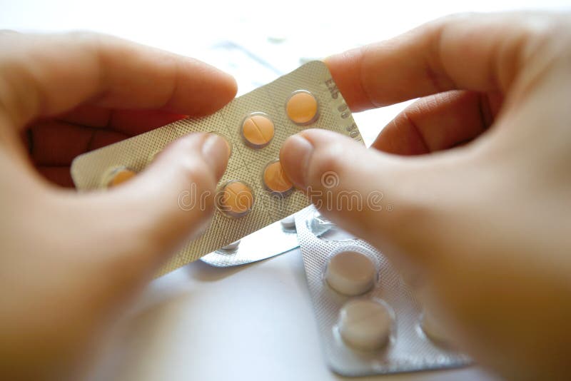 Hand popping pills stock image. Image of oral, healthcare - 4633031