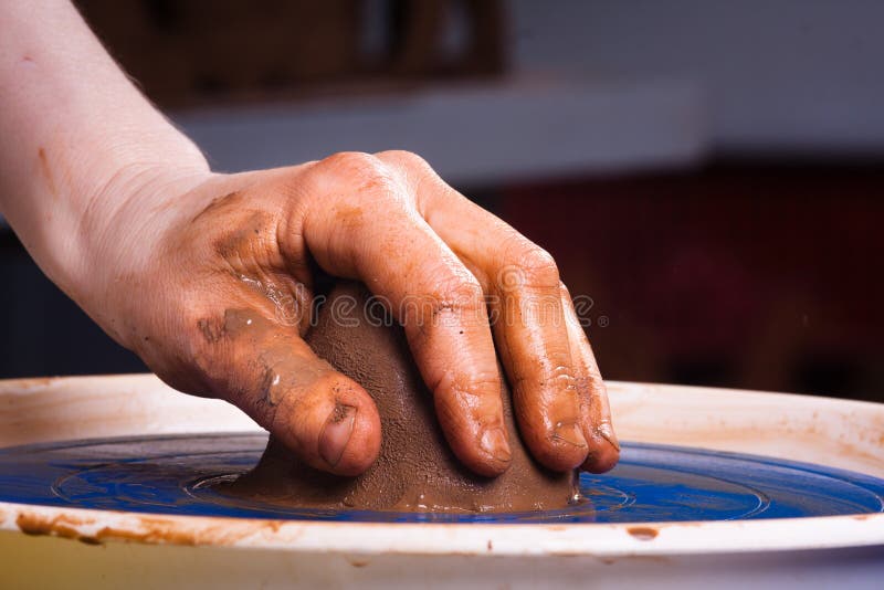 Hand of Potter with Clay on Pottery Wheel Stock Image - Image of ...