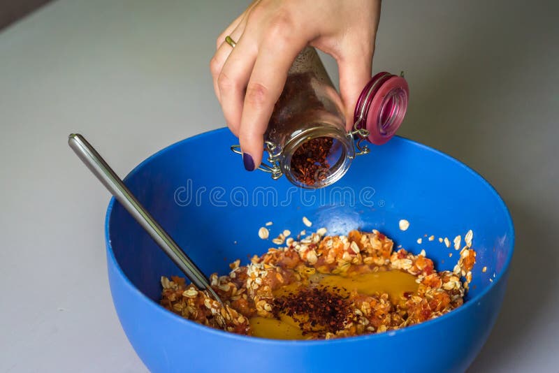 Hand Pour in Pepper in Stuffing Stock Photo - Image of griddle ...