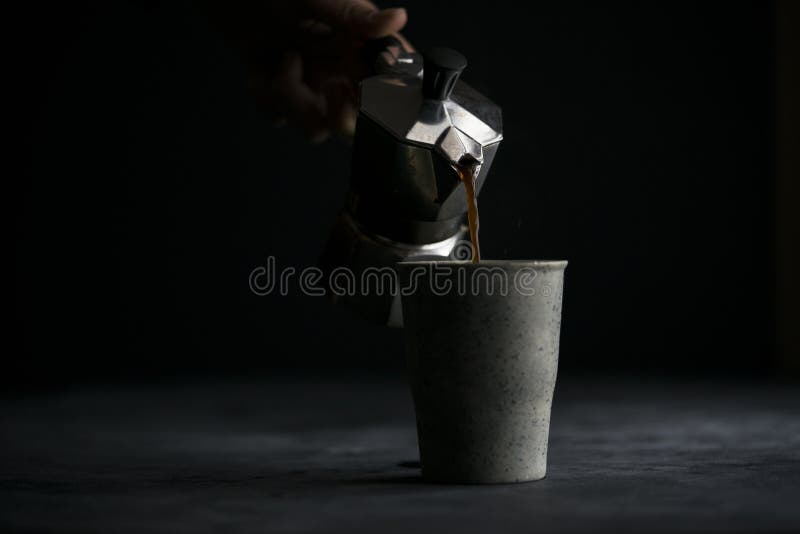 Hand Pouring Coffee with a Moka Pot Stock Image - Image of blackboard ...