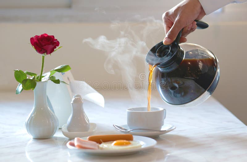 Hand pouring coffee stock image. Image of table, hand - 120838001
