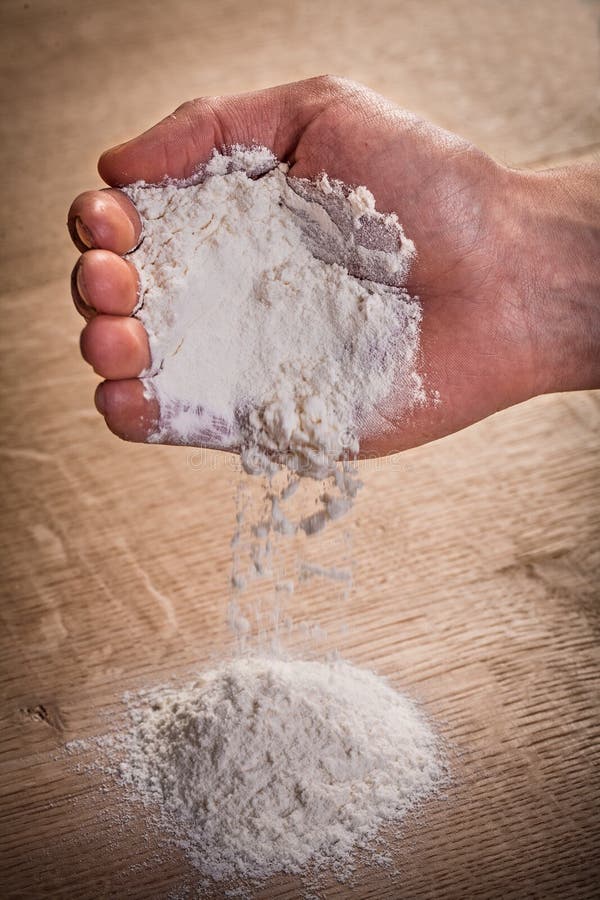 Hand Pouring Flour on Table Food and Drink Concept Stock Photo - Image ...