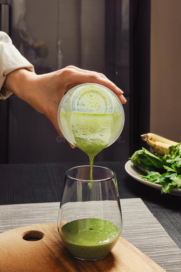 Hand Pouring Healthy Smoothie in Glass Stock Photo - Image of drink ...