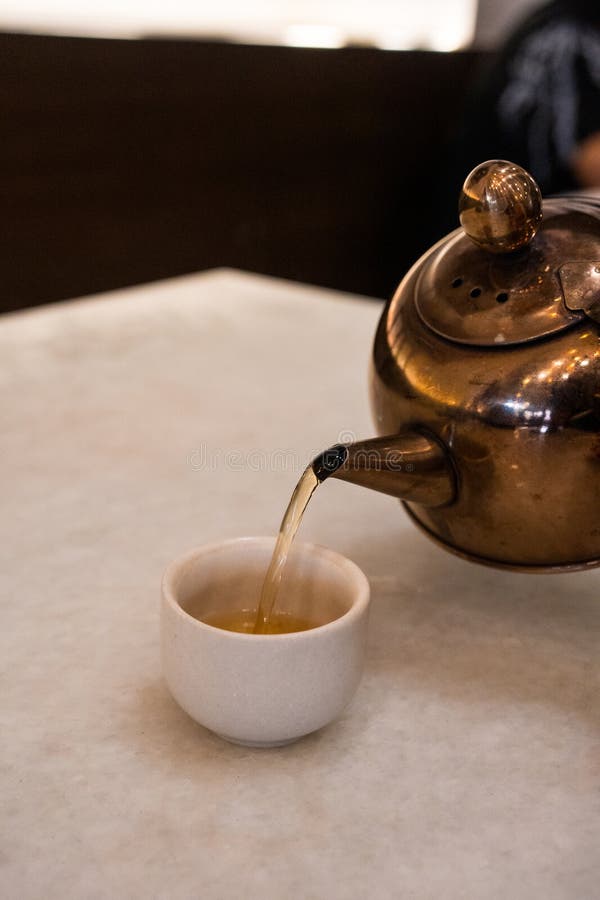 Hand Pouring Hot Tea from Teapot Stock Image - Image of cosy, enjoyment ...