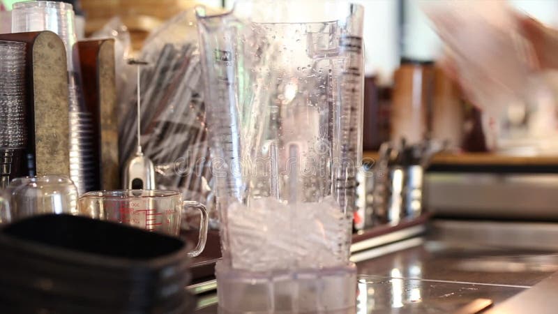 Hand Pouring Ice Cubes in a Blender. Stock Video - Video of creative ...