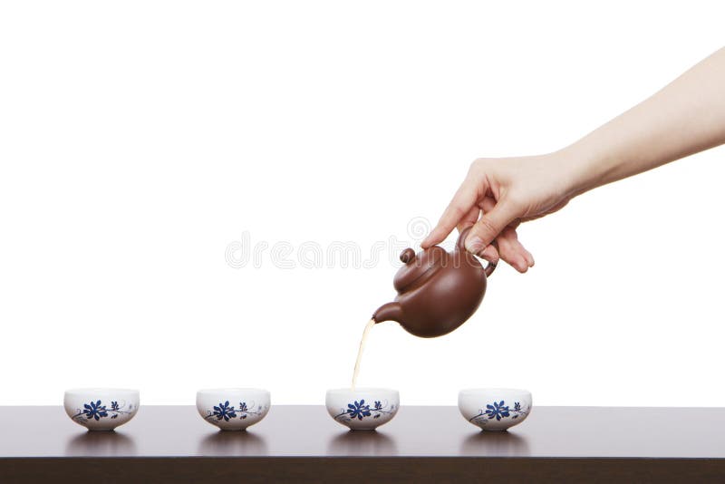 A Hand in Pouring Tea Closeup Stock Photo - Image of females, tradition ...