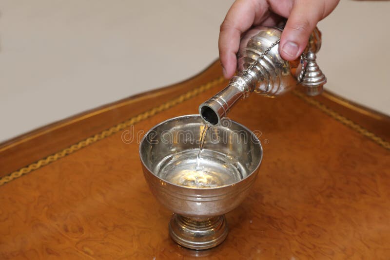 Hand pouring water stock photo. Image of closeup, purify - 75395620