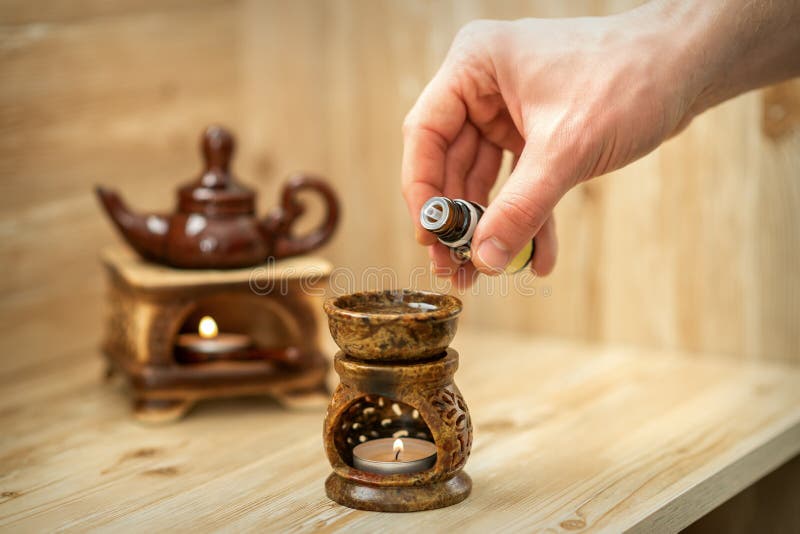 Hand Pours Essential Oil To Diffuser Stock Image - Image of healthy ...
